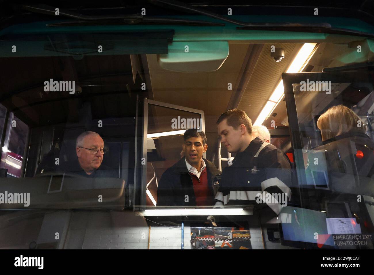 Prime Minister Rishi Sunak during a visit to a bus depot in Harrogate ...