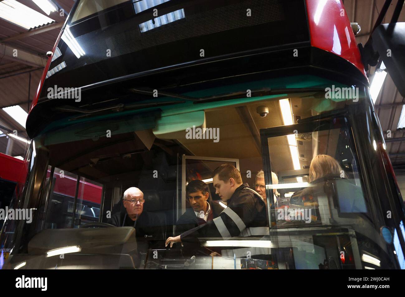Prime Minister Rishi Sunak during a visit to a bus depot in Harrogate ...