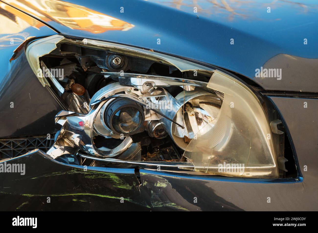 Broken vehicle headlight after traffic accident, selective focus Stock ...
