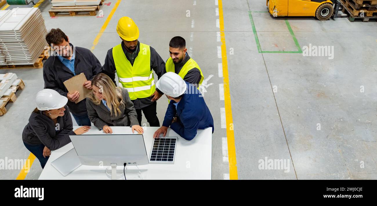 Top view of full team of warehouse employees in warehouse. Team of ...