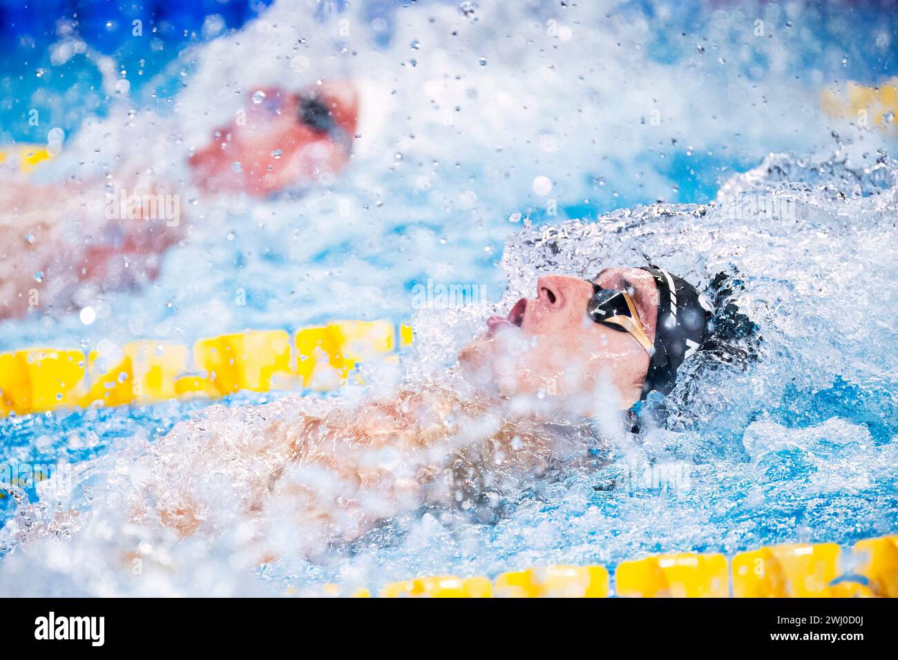 Swimming mens 100 backstroke preliminaries hi-res stock photography and ...