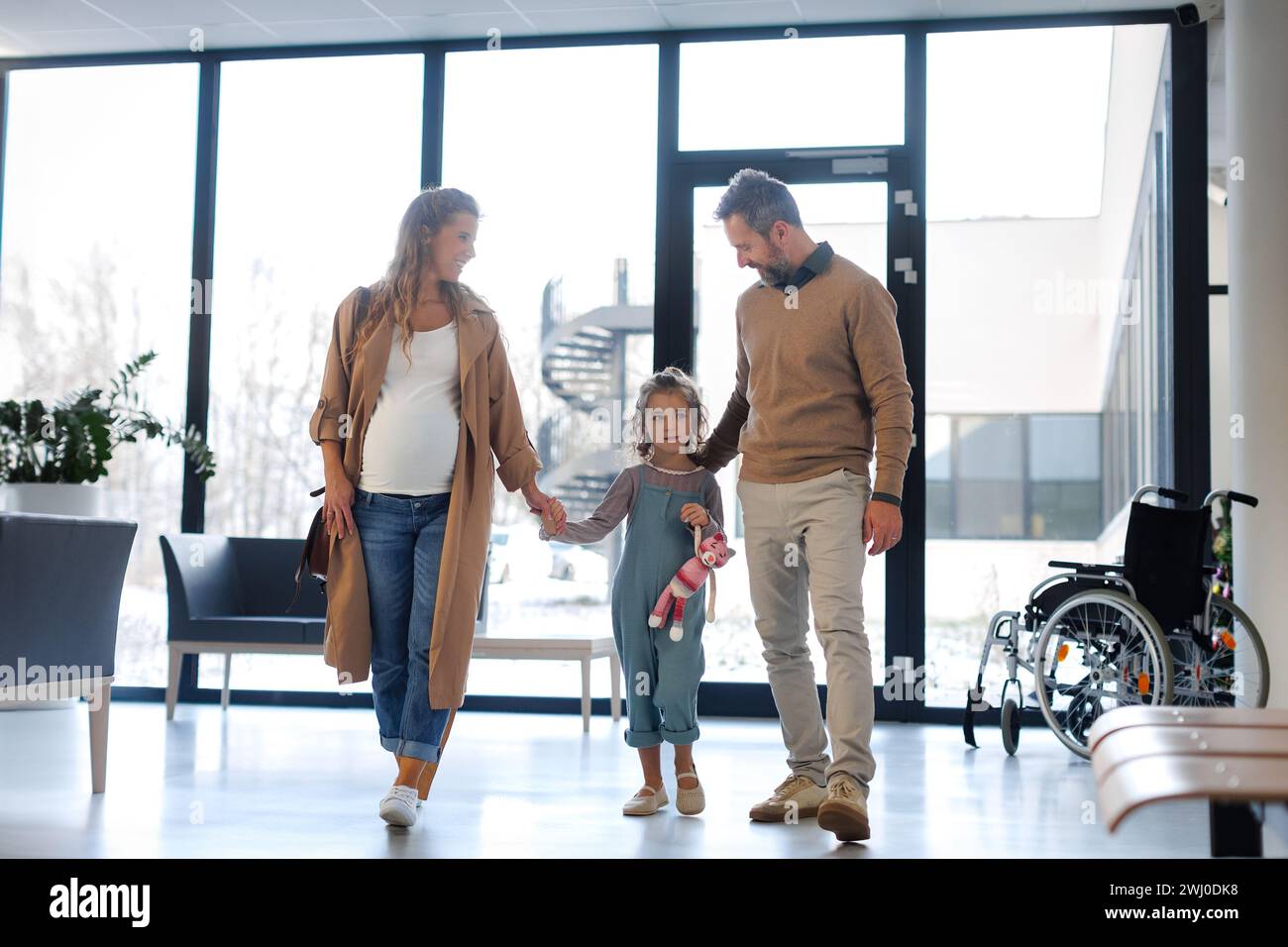 Girl patient at examination in a modern clinic. Girl arriving in ...