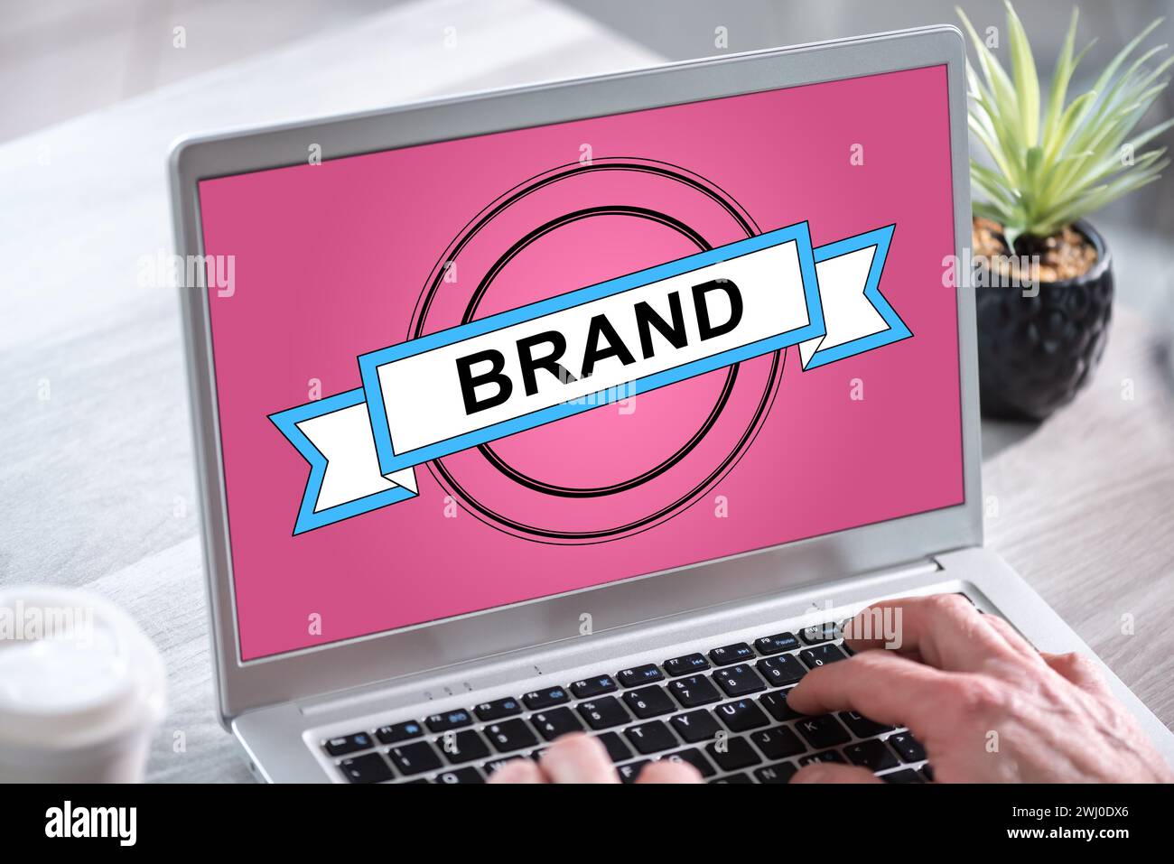 Laptop screen displaying a brand concept Stock Photo - Alamy