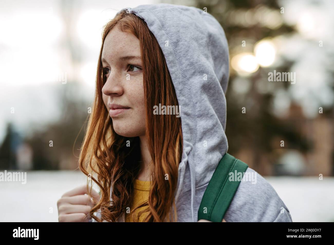 Portrait of beutiful red head gen z girl outdoors. Girl with copper ...