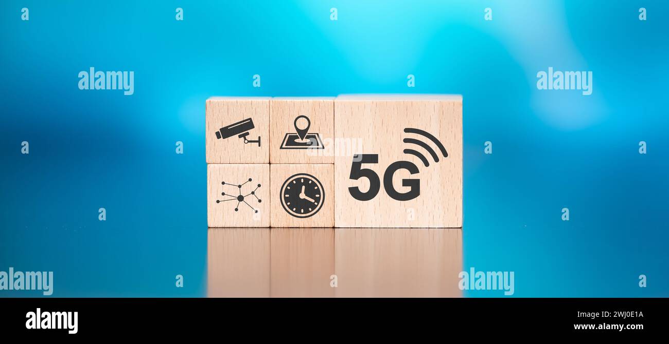 Wooden blocks with symbol of 5g concept on blue background Stock Photo ...