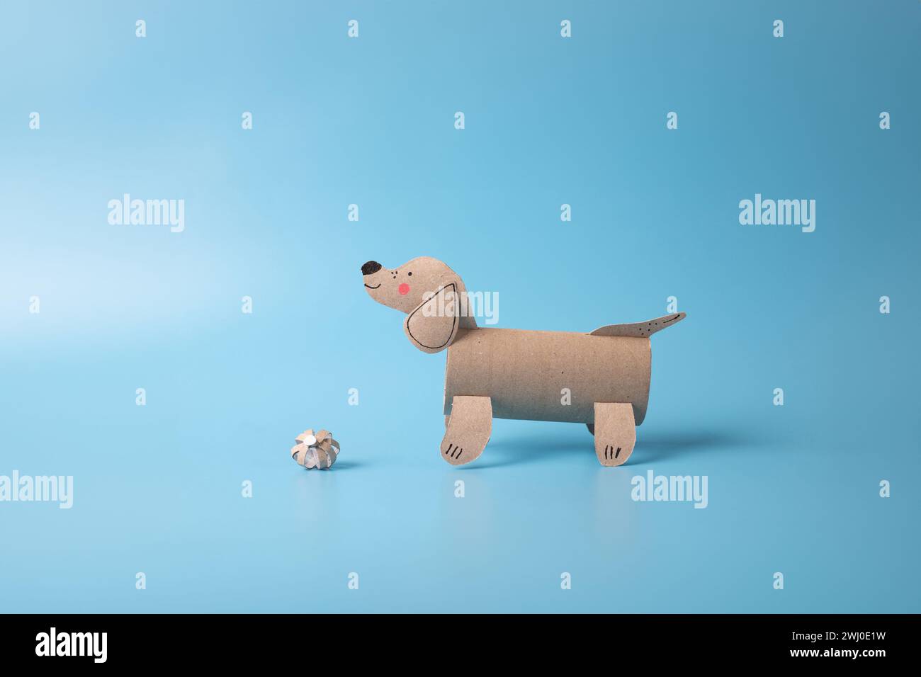 a dog made out of toilet paper roll, cut out of cardboard, dachshund ...