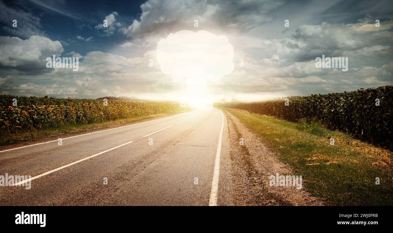 Nuclear explosion in an outdoor setting with blue sky cloud and ...