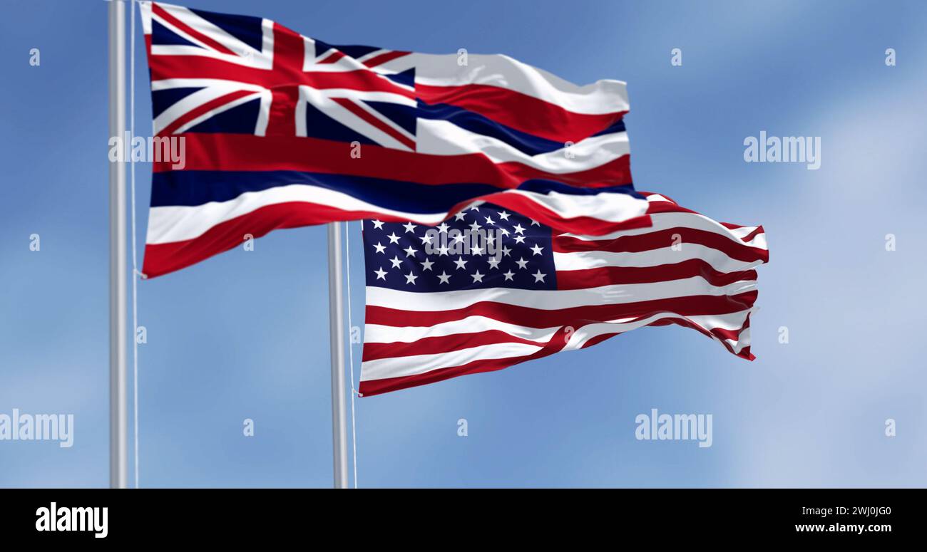 Hawaii state flag waving with the national flag of the United States of ...