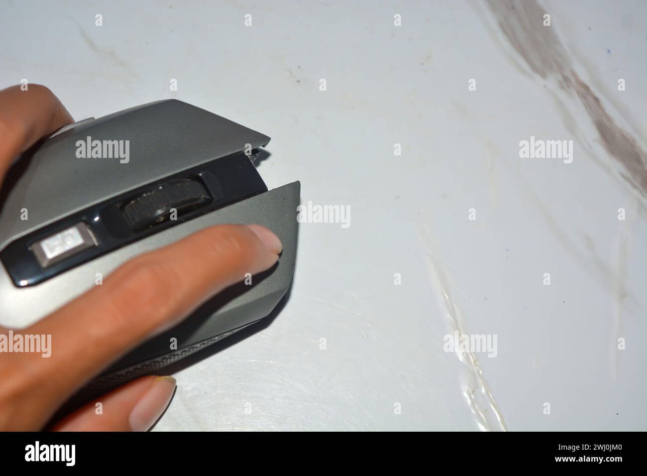 Gray color mouse on white background Stock Photo - Alamy