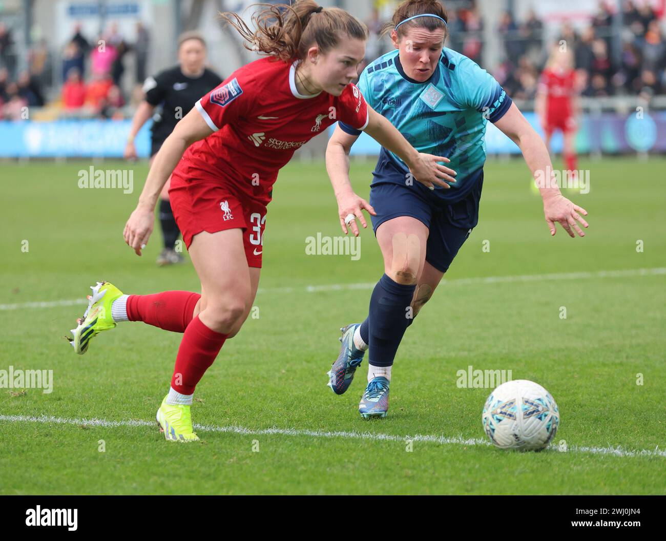 Lucy Parry of Liverpool Women takes on Emma Mukandi of London City ...