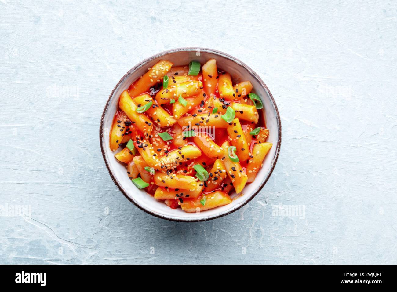Tteokbokki or topokki, Korean street food, spicy rice cakes Stock Photo ...