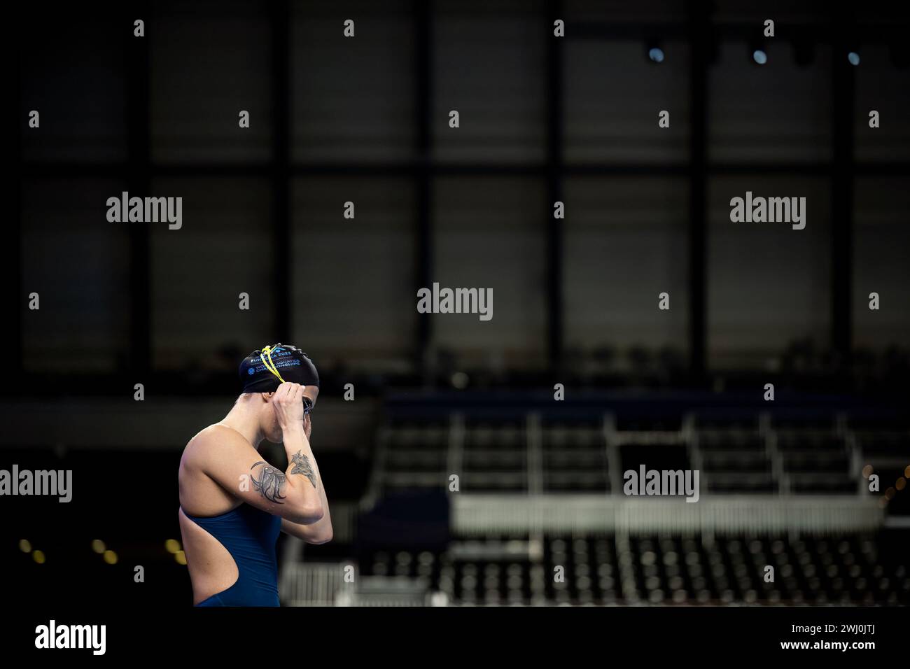 Doha, Qatar. 11th Feb, 2024. A swimmer trains before the start of the ...