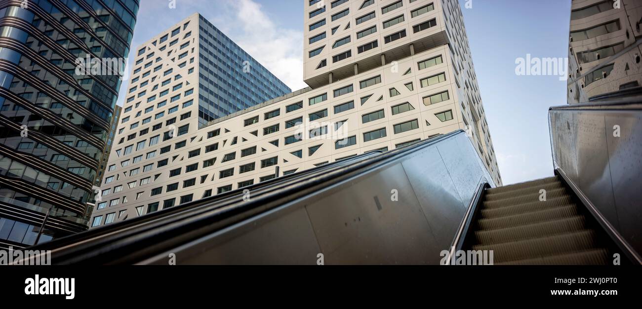 Central train station entrance. Panorama of modern high rise buildings ...