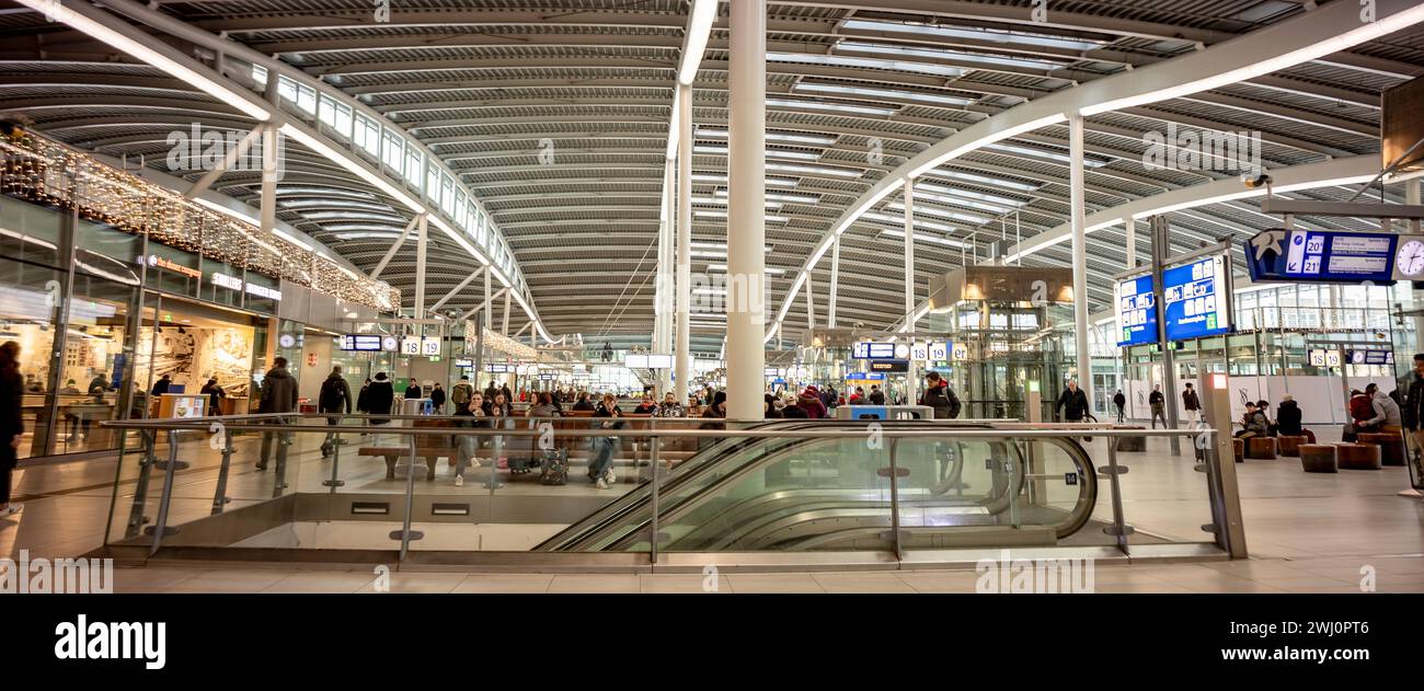 Interior of largest Dutch central train station hallway. Panorama of ...