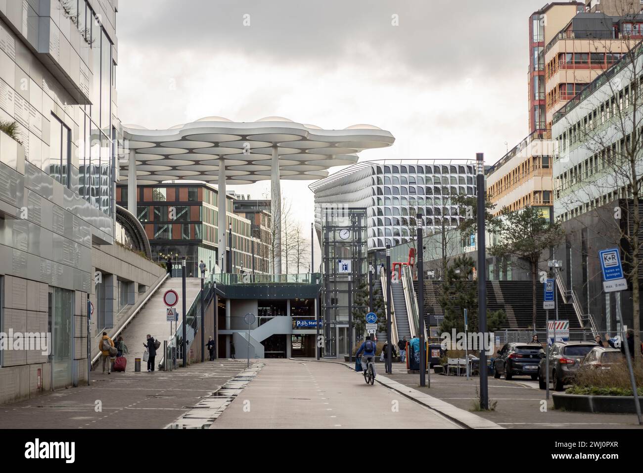 Central train station entrance. Panorama of modern high rise buildings ...