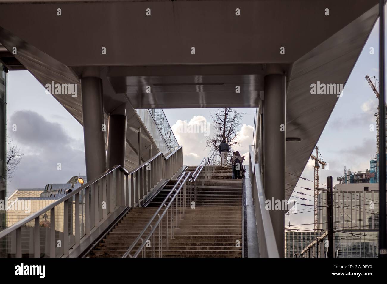 Dutch urban scene with open air overpass elevator and staircase with ...