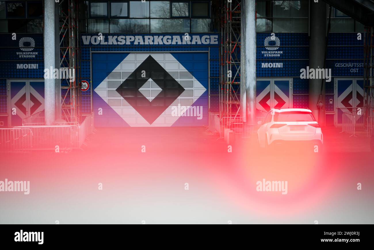 12 February 2024, Hamburg: Exterior view with barrier at the parking ...