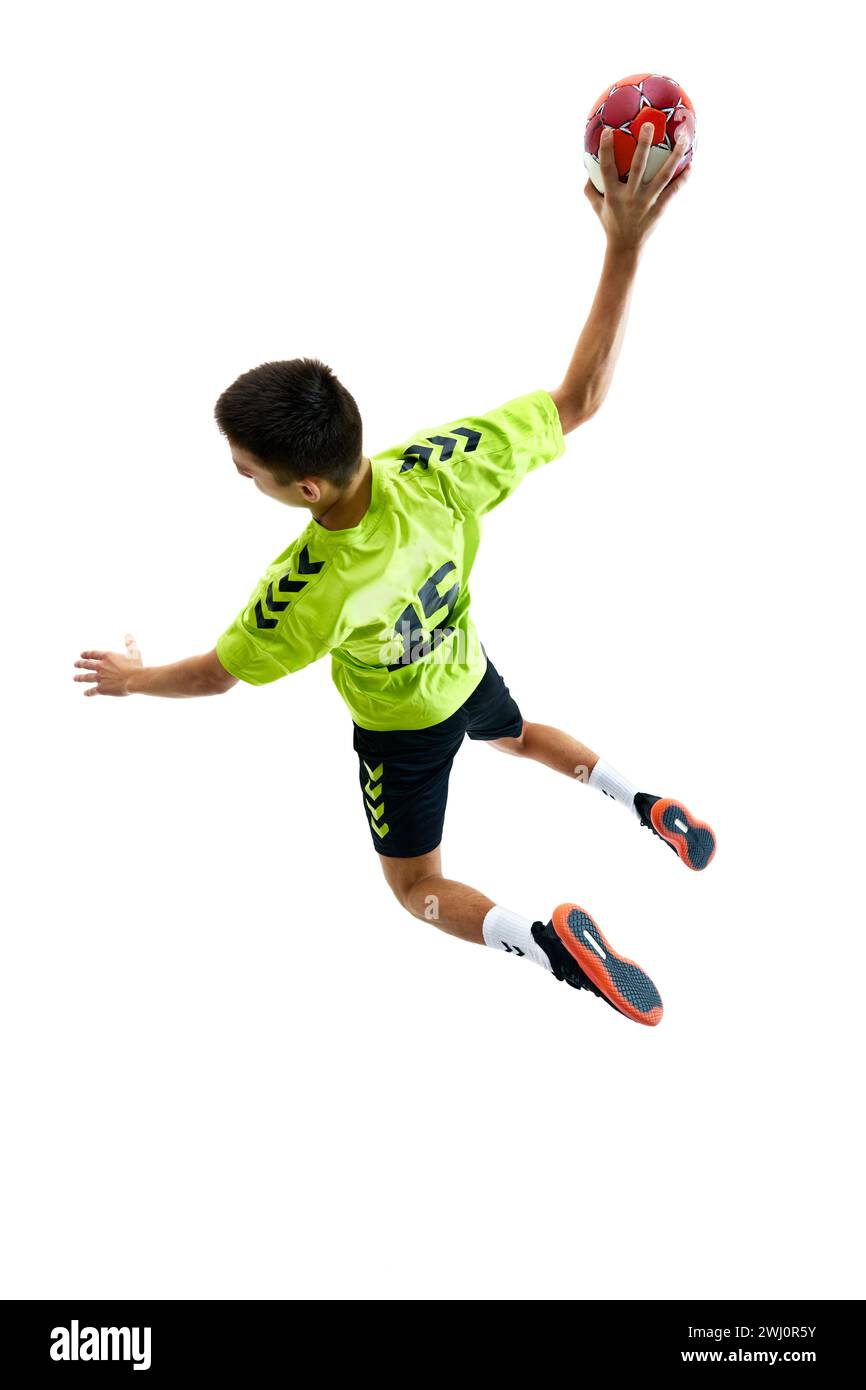 Top view image of young guy, handball player in motion during game ...