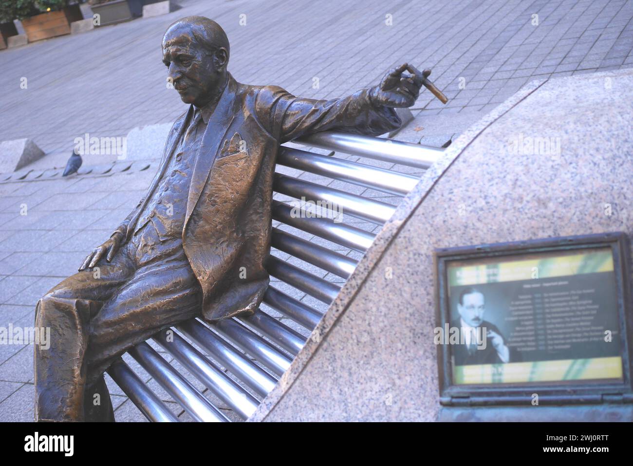 Bronze statue of Hungarian composer Imre Kalman seated on a bench in ...