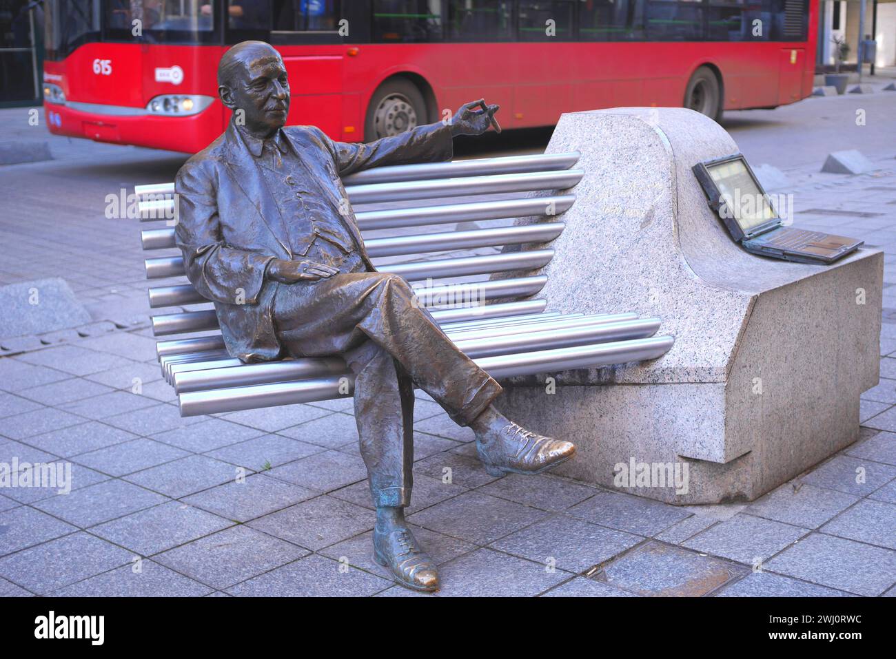 Bronze statue of Hungarian composer Imre Kalman seated on a bench in ...