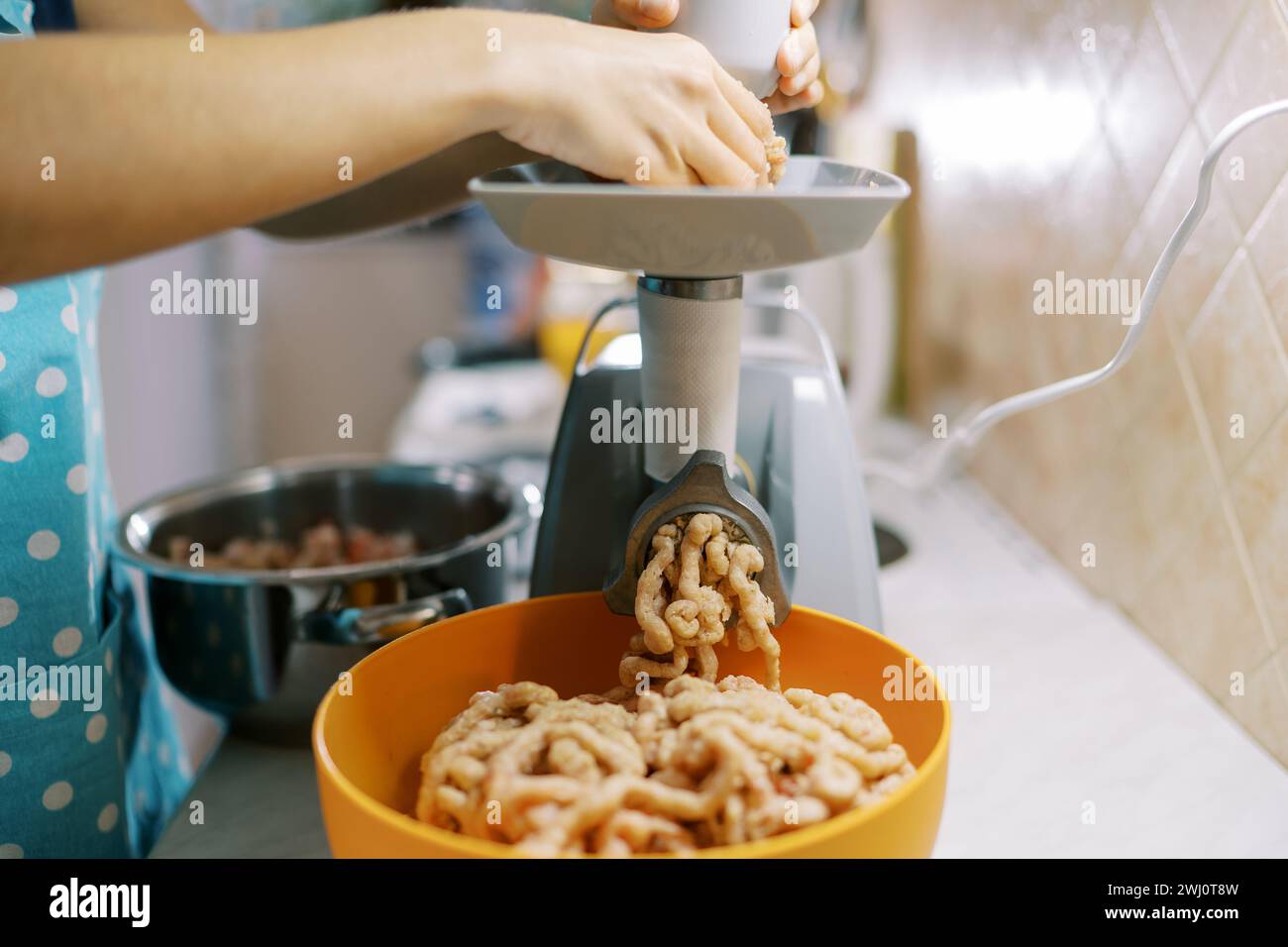 Meat grinder twists minced hi-res stock photography and images - Alamy