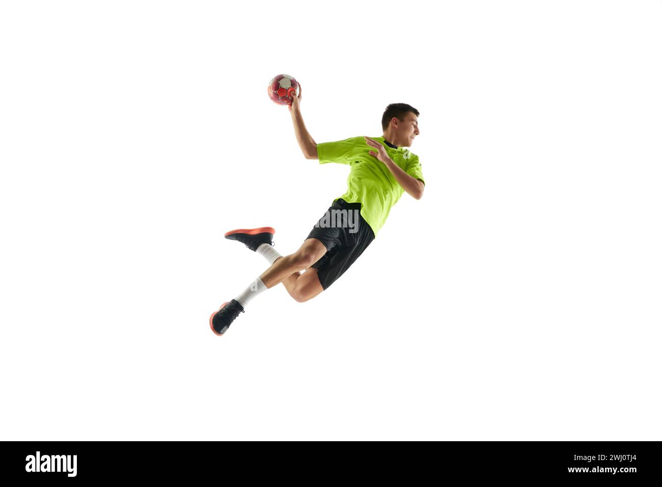 Concentrated and motivated young man, handball player in motion during ...