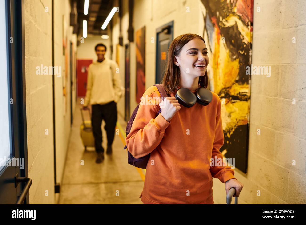 Man walk behind woman hi-res stock photography and images - Alamy