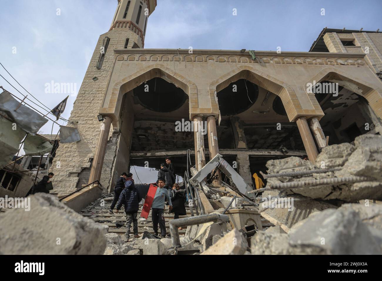 12 February 2024, Palestinian Territories, Rafah: Palestinians inspect ...