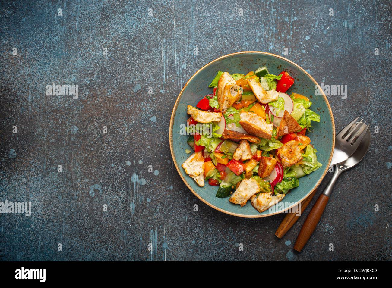 Traditional Levant dish Fattoush salad, Arab cuisine, with pita bread ...