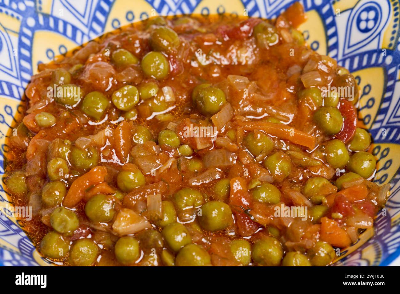Pea food cooked in a plate ready to be served Stock Photo - Alamy