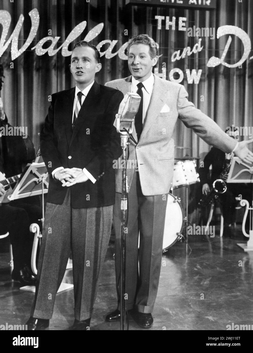 Bing Crosby and Danny Kaye singing onstage with a band - scene from ...