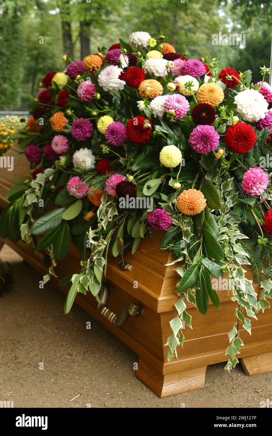 Coffin with flowers Stock Photo - Alamy