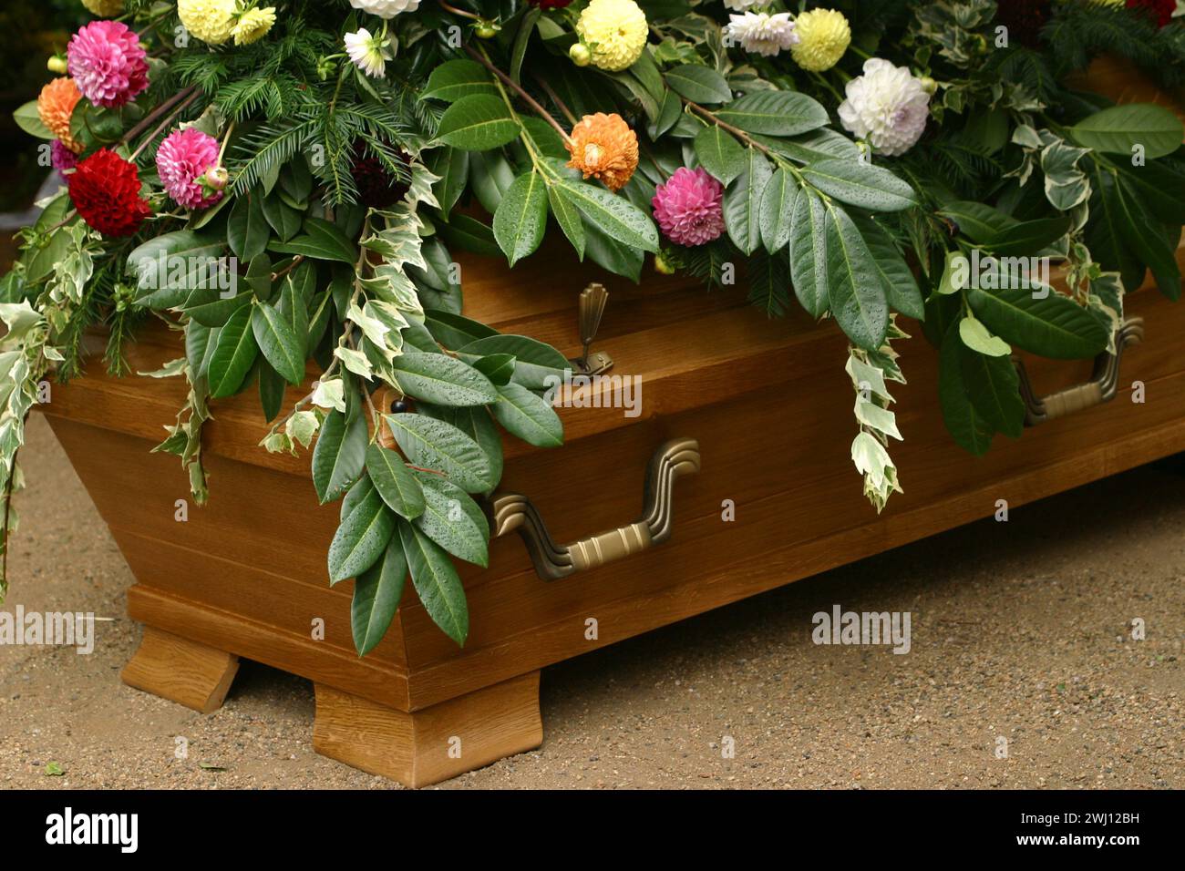 Coffin with flowers Stock Photo - Alamy