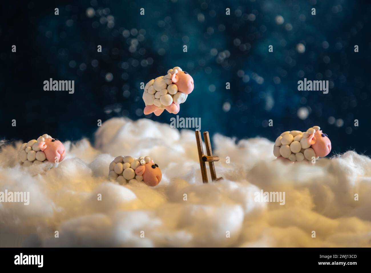 Cute plasticine sheep jumping over a fence in the clouds. Count sheep ...