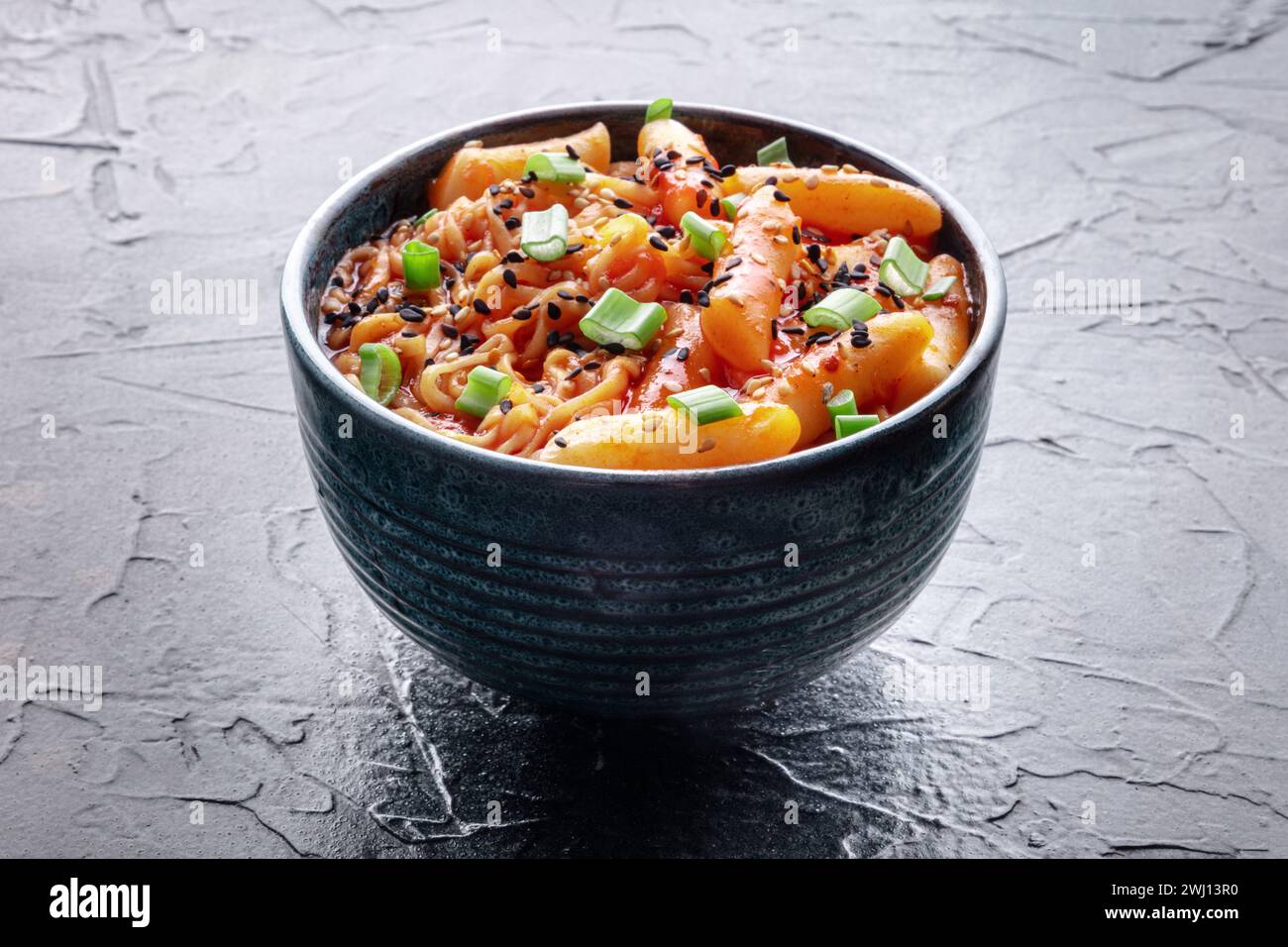 Rabokki, tteokbokki or topokki with ramen, Korean street food, spicy ...