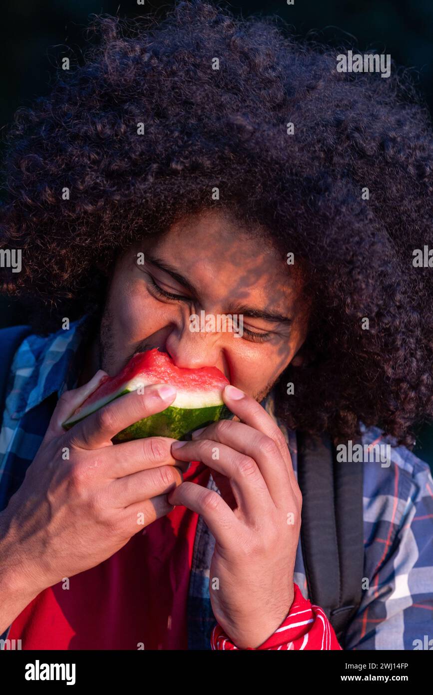 The image showcases a young North African, Tunisian man with a dense ...