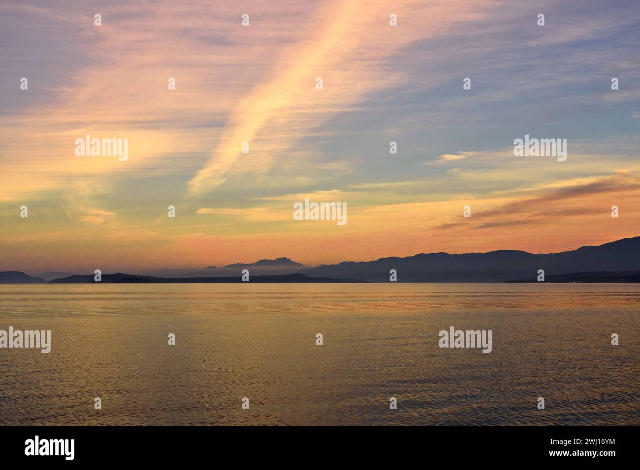 Distant mountains at sunset hi-res stock photography and images - Alamy