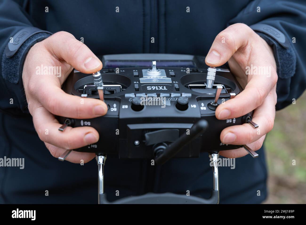 LVIV, UKRAINE - Feb. 11, 2024: A young man is seen controlling the ...