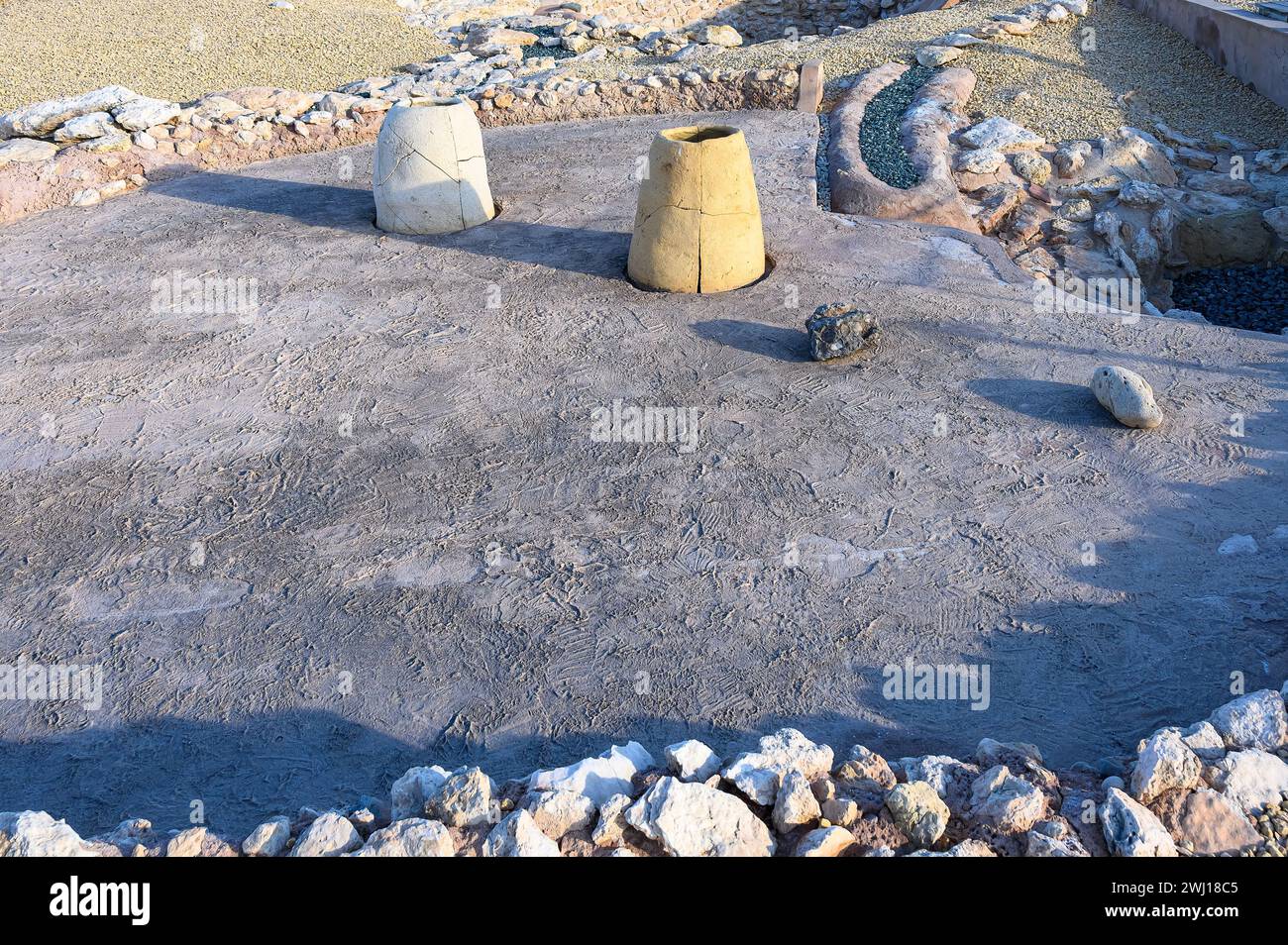 Two ancient containers in the floor of a building. Ruins and ...