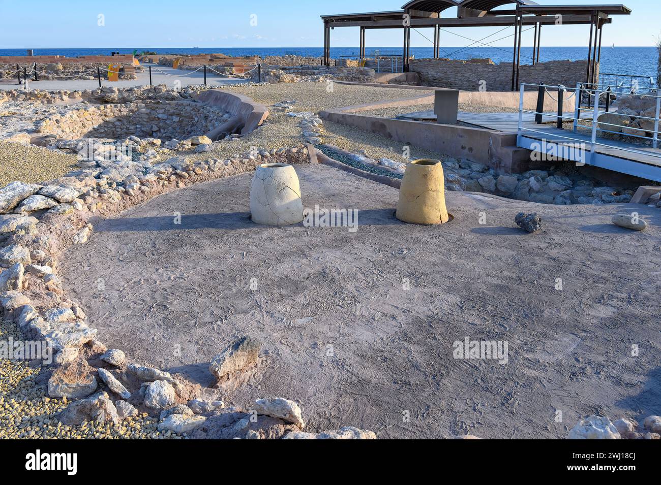 Two ancient containers in the floor of a building. Ruins and ...