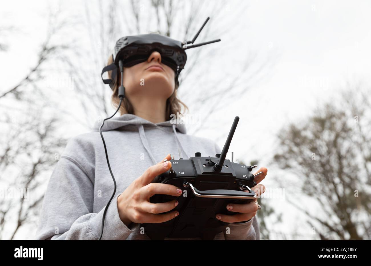 LVIV, UKRAINE - Feb. 11, 2024: A young woman is seen wearing virtual ...