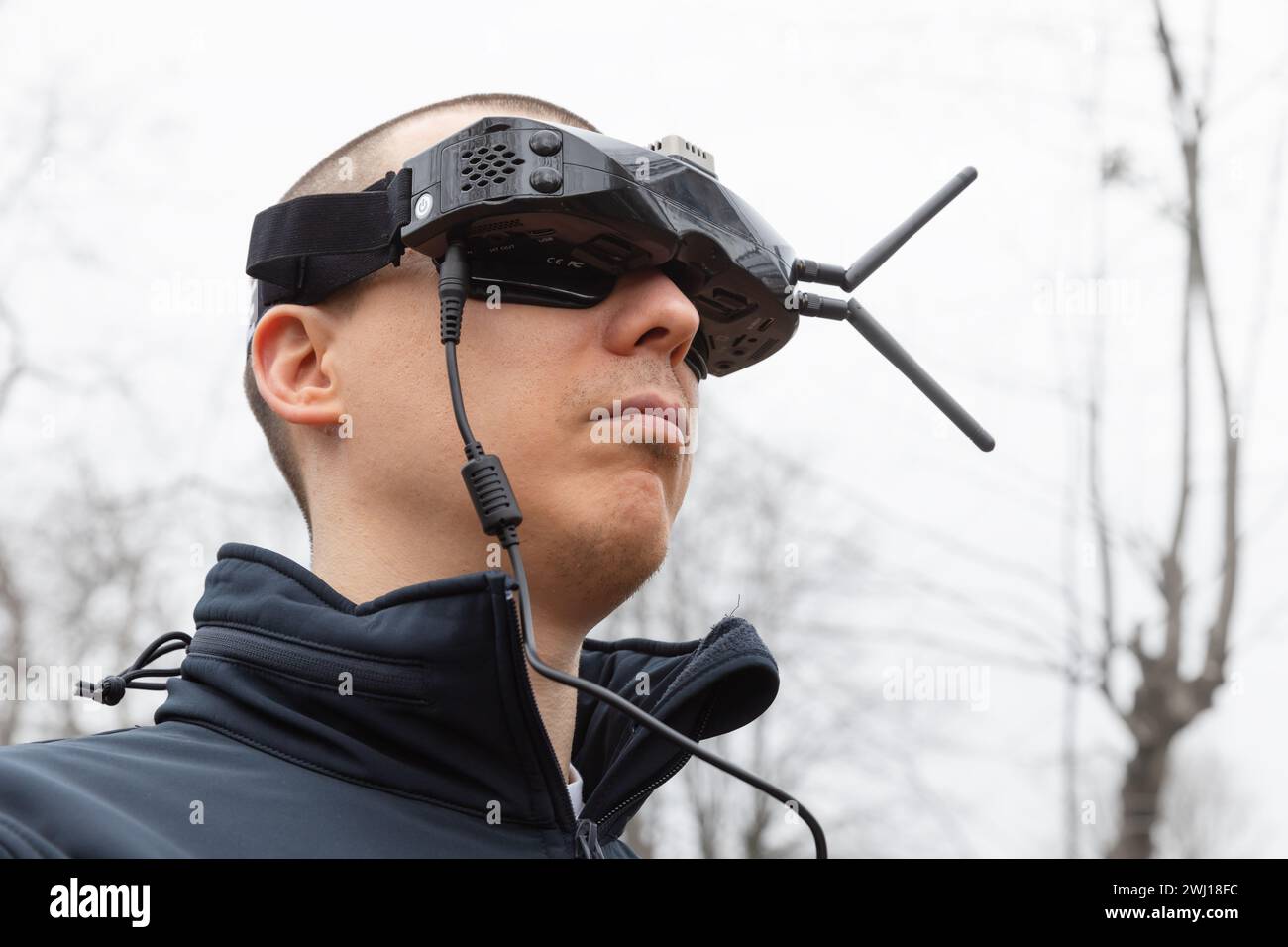 LVIV, UKRAINE - Feb. 11, 2024: A young man is seen wearing virtual ...