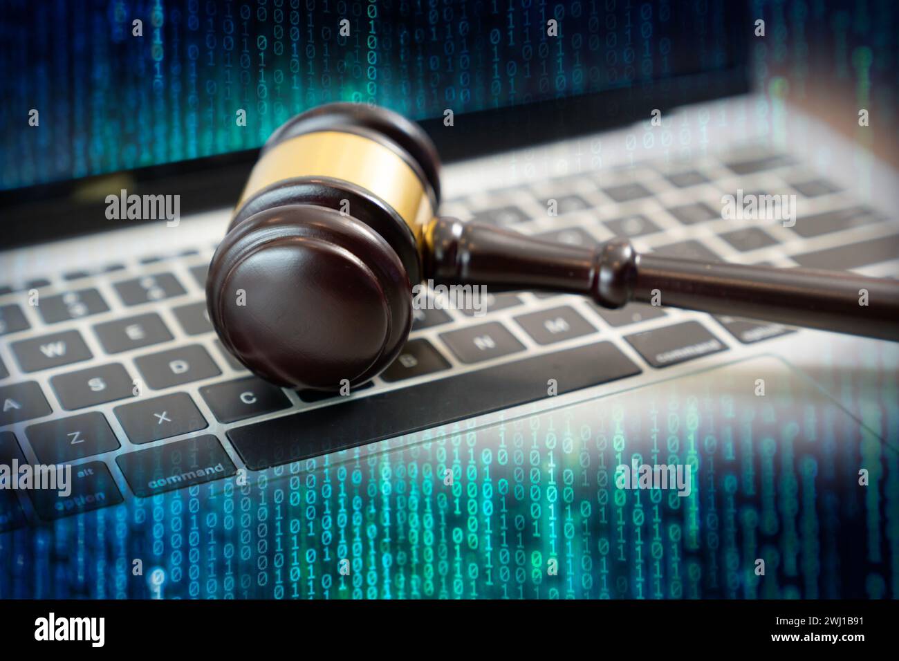 Laws regarding cyber crimes, Justice gavel on laptop computer keyboard ...
