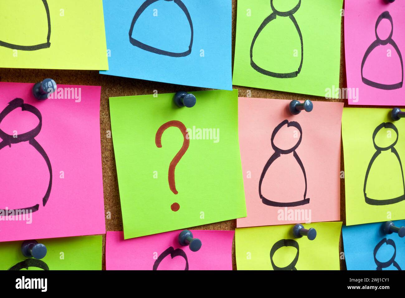 Buyer marketing research. Pinned colored stickers and a question mark ...