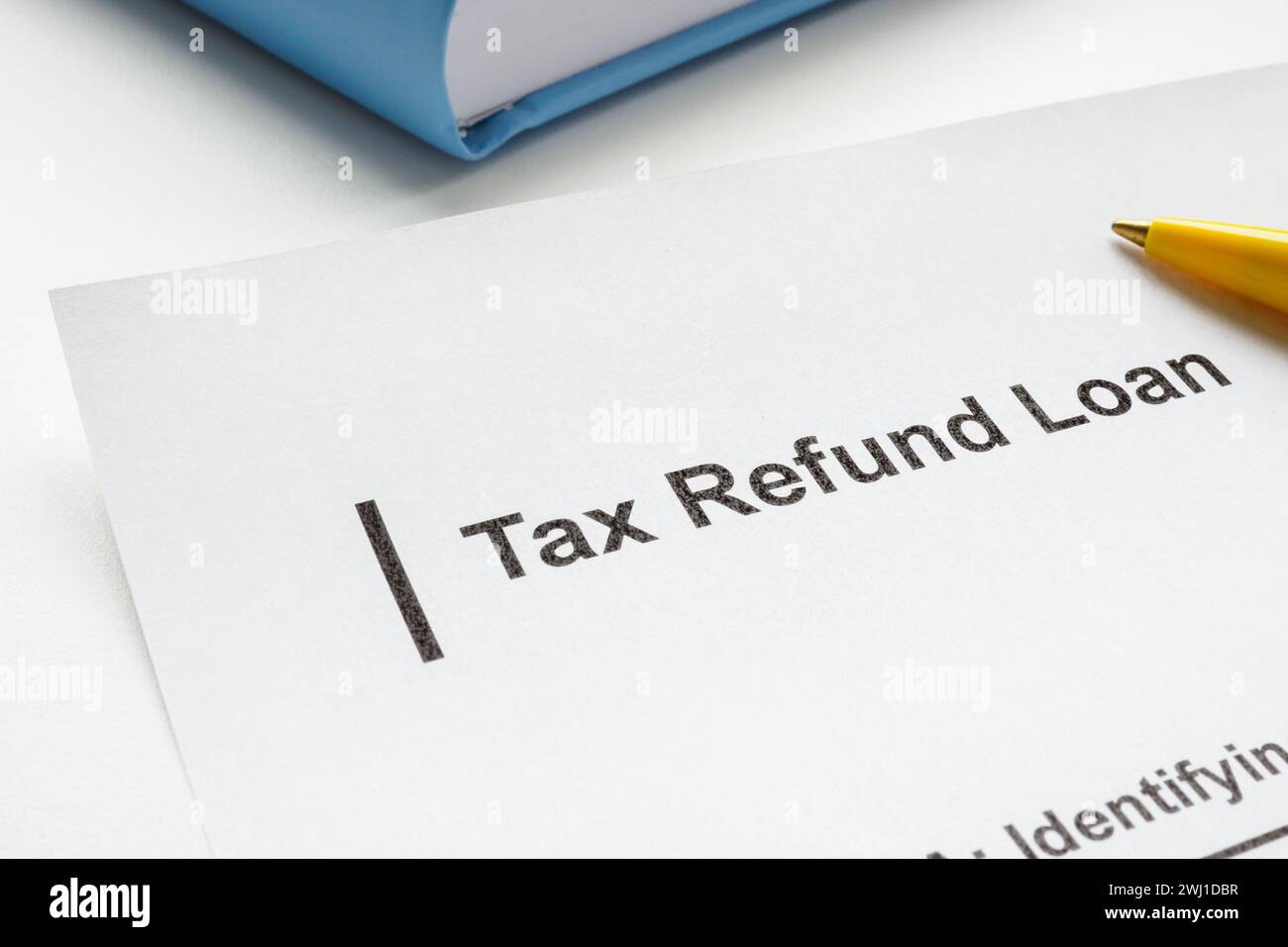 Tax refund loan application and pen Stock Photo - Alamy