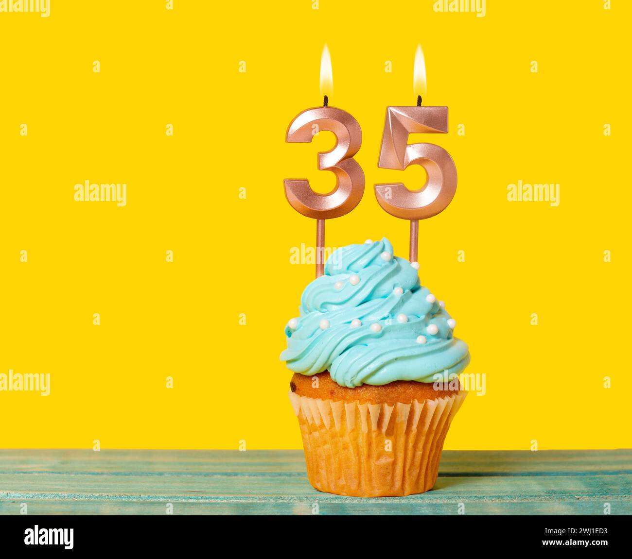 Birthday Cake With Candle Number 35 - On Yellow Background Stock Photo ...