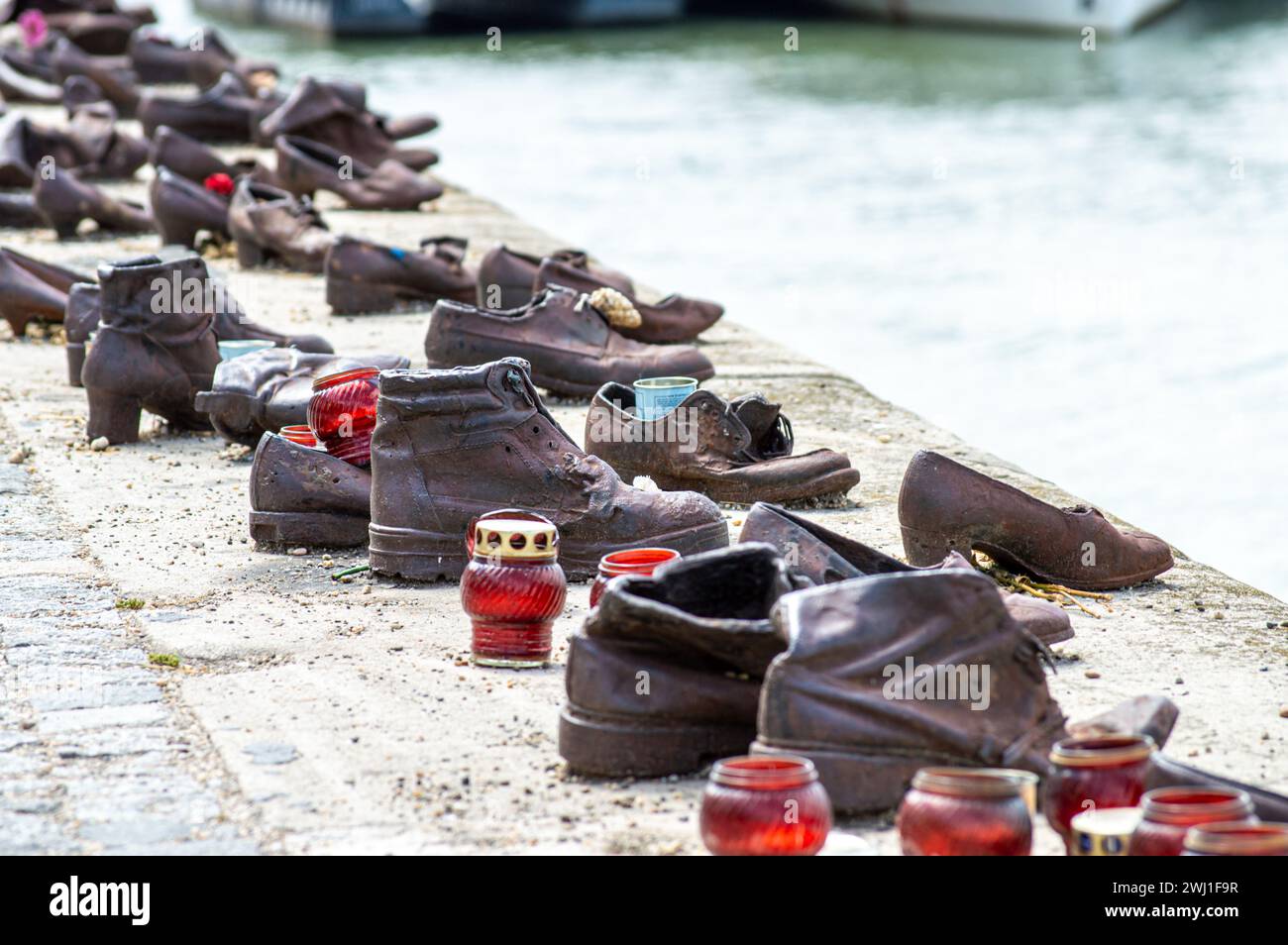 BUDAPEST, HUNGARY - JULY 7, 2023: The Shoes on the Danube Bank is a ...