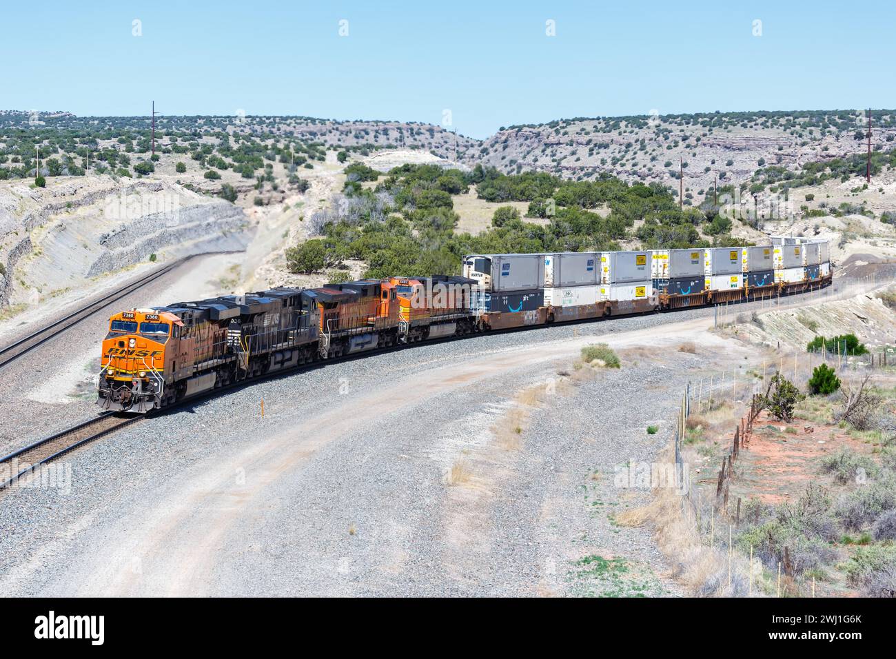 Freight train of BNSF Railway with containers train railroad at Abo Pass in New Mexico, USA ...