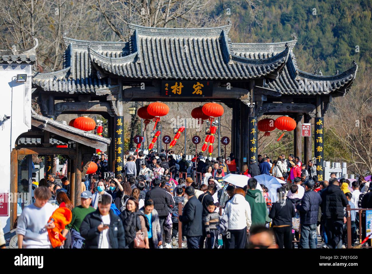 HUANGSHAN, CHINA - FEBRUARY 12, 2024 - Tourists visit Hongcun village ...