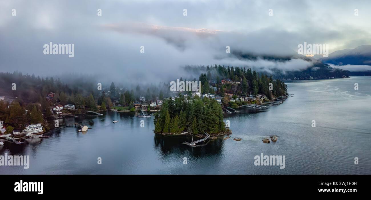 Residential Homes on the Ocean Shore with mountains in background. Deep ...